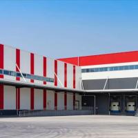 China Q355B Steel Structure Warehouse with 35-50 Years Lifespan and Wind, Snow, Seismic Resistant Portal Frame Design for sale
