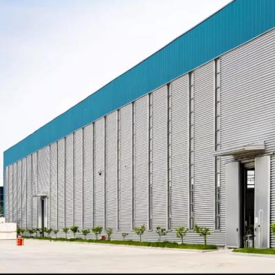 China Heavy Duty Steel Structure Warehouse Q355B Steel Frame Industrial Workshop Metal Building Construction for sale