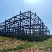 China Prefabricated Steel Structure Building with Portal Frame Design, 30-50 Year Life Span, and 20+lb/sq.ft Roof Load for sale