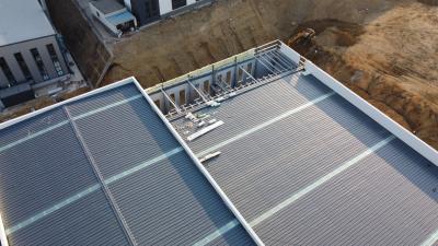 China Q355B Raw Steel Material Prefabricated Steel Structure Fixed Upon The Flat Roof Optional Insulation Panels for Space Utilization for sale