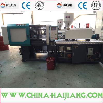 China Blue And White rotary shaft two color injection molding machine featuring 380V 50Hz 3Phase power supply suitable for multi color plastic molding for sale