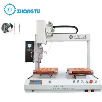 China Intelligent Control 4 Axis Double Platform Soldering Machine for Precise Operation for sale