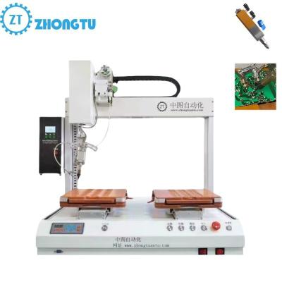 China Desktop Automatic 4 Axis Soldering Robot PCB Solder Machines with Soldering Accuracy ±0.1mm and Power Consumption 100W for sale