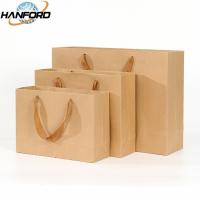 China Antiwear Moistureproof Kraft Paper Gift Bags With Handles Multipurpose for sale