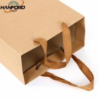 China Antiwear Moistureproof Kraft Paper Gift Bags With Handles Multipurpose for sale