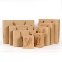 China Antiwear Moistureproof Kraft Paper Gift Bags With Handles Multipurpose for sale