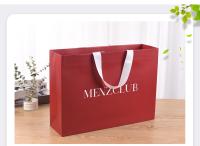 China Ultralight Party Kraft Paper Gift Bags With Handles Biodegradable for sale