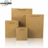 China Brown Biodegradable Bulk Craft Paper Bags , Durable Paper Shopping Bags With Handles for sale