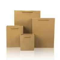China Brown Biodegradable Bulk Craft Paper Bags , Durable Paper Shopping Bags With Handles for sale