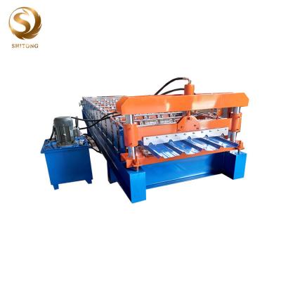 China automatic iron sheet trapezoid roof wall plate cold roll forming machine for sale