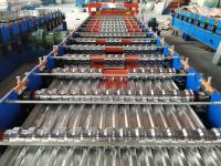 China trapezoidal galvanized roofing panels rolls forming machine with film laminating for sale