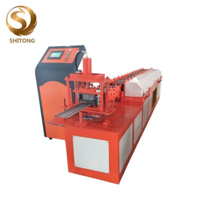 China Automatic Color Steel Roller Shutter Door Roll Forming Machine 12 Rows 4KW 15-20m/min Production for sale