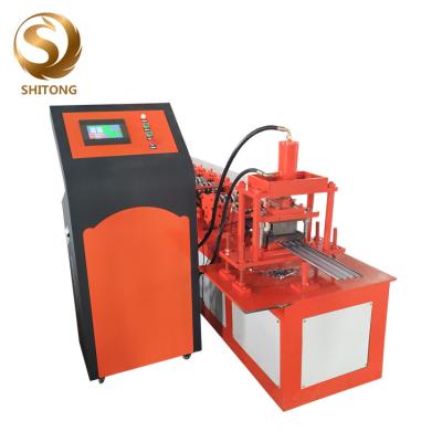 China Automatic Steel Roll Up Shutter Door Making Machine - 12-Roll Forming Line with 4KW Power and 15-20m/min Speed for sale