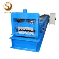 China Rolling Shutter Strip Door Roll Forming Machine 12-Row 4KW with PLC Control for 0.3-0.8mm Materials for sale