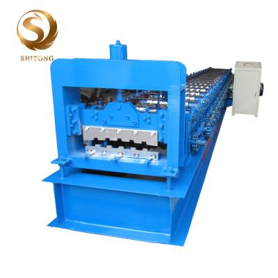 China Rolling Shutter Strip Door Roll Forming Machine 12-Row 4KW with PLC Control for 0.3-0.8mm Materials for sale