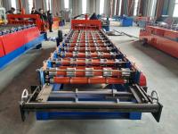 China hydraulic drive glazed roof panel tile roll forming machine manufacture for sale
