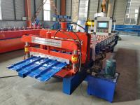 China hydraulic drive glazed roof panel tile roll forming machine manufacture for sale