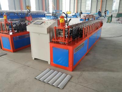 China 100-151 model roller shutter door colored steel sheet cold roll forming making machine for sale