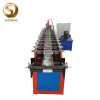 China hot sell flying saw cutter shutter door rolling door roll forming machine for sale