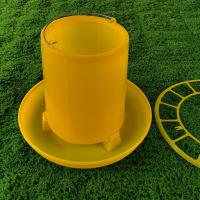 China Heavy Duty Poultry Feed Bucket Large Capacity Red And Yellow Storage Container For Feeding for sale