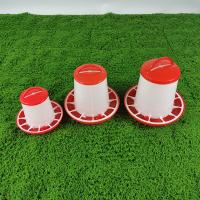 China Modern Red And White Cylinder Poultry Feeder 3.5L Capacity Waterproof And Easy To Clean for sale