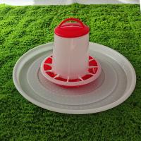 China Standard Size Red Round Chicken Feeding Tray For Poultry Production for sale