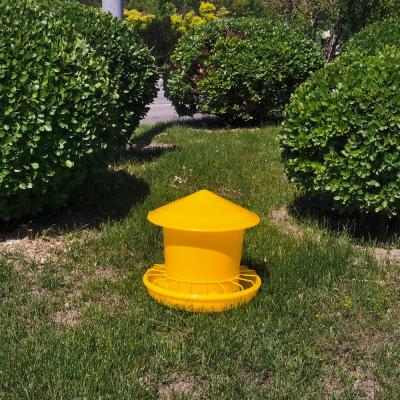 China Thick Yellow Poultry Feeding Bucket Farm Feeder Pigeon Chick Feeding Equipment Sturdy Durable Round Design for sale