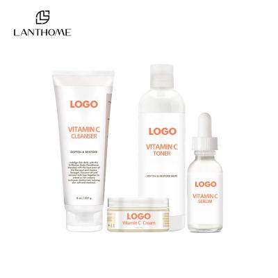 China Vitamin C Skin Care Gift Set 4 Piece Face Cleanser Toner Serum Cream Shrink Pores Dark Spots for sale