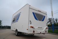 China Flatness Small Camper Trailer FRP Lightweight Rv Camper Trailers With Kitchen for sale