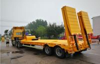 China Heavy-Duty Hauling Made Possible 150T Low Bed Semi Trailer Q345B With T700 Steel Main Beam for sale