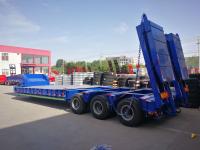 China Heavy-Duty Hauling Made Possible 150T Low Bed Semi Trailer Q345B With T700 Steel Main Beam for sale