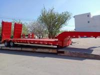 China Heavy-Duty Hauling Made Possible 150T Low Bed Semi Trailer Q345B With T700 Steel Main Beam for sale