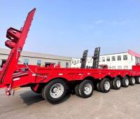 China Q345B/ T700 Steel Main Beam Low Platform Trailer For Heavy Load Transportation for sale