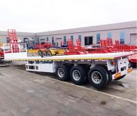 China Truck Trailer Flatbed Semi Trailer With 30-60 Tons Loading Capacity And 1 Tool Box Big Chamber for sale
