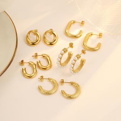 China 18K Stainless Steel Hollow Earrings Female Retro Light Luxury Titanium Steel Earrings Geometric Ring Water Drop Studs Earrings for sale
