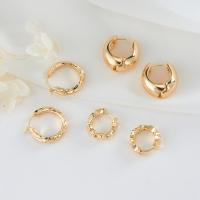 China Fashion Brass 14K Gold Plated Irregular Wavy Surface Geometric Round Women's Jewelry Earrings for sale