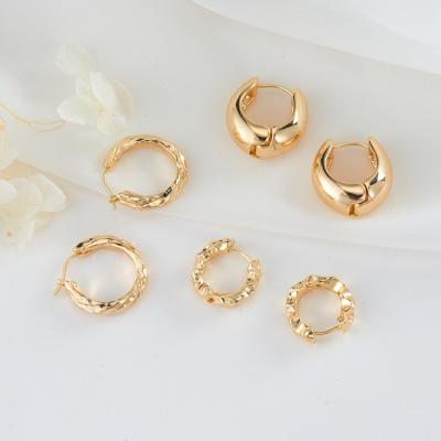 China Fashion Brass 14K Gold Plated Irregular Wavy Surface Geometric Round Women's Jewelry Earrings for sale