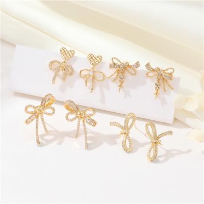 China Hot Selling Earrings Accessories 14K Gold Bow Earrings for Women Cute Heart Shaped Straps Earings DIY Jewelry Findings for sale