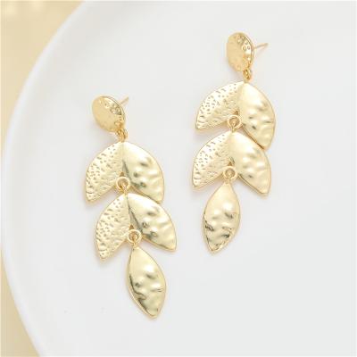 China Hot Selling Luxury Brass 14K Gold Plated Dangle Design Tree Leaf Silver Needle Jewelry  Stud Earrings for Girls Party Gifts for sale