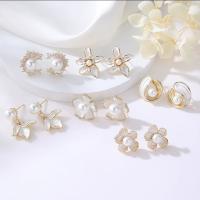 China Jiexing Fashion 925 Silver Needle Studs 14k Plated Gold Enamel Pearl Flower Leaf Zircon Women's Jewelry Earrings for sale