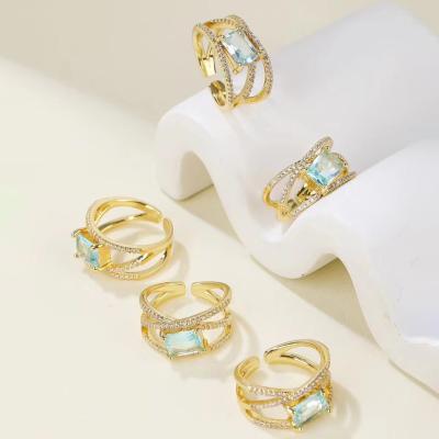 China Jiexing Trendy Finger Rings 14K Gold Plated Adjustable Blue Hollow Zircon Finger Ring Women Jewelry for sale
