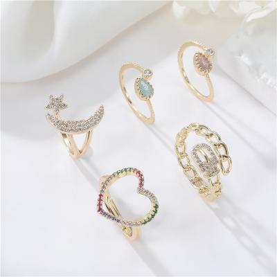 China Jiexing Trendy Finger Rings 14K Gold Plated Adjustable Fashion OL Color Zirconia Minimalist Love Belt Opening Ring for sale