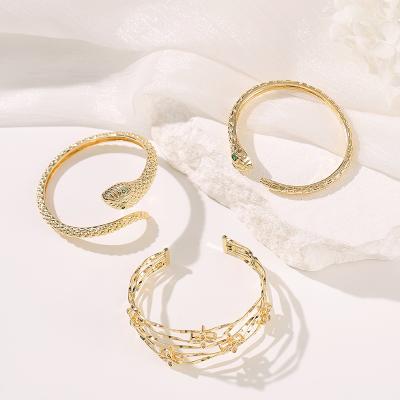 China Latest Fashion Jewelry Round Shape Two Knots 14K Gold Plated Bangle for sale