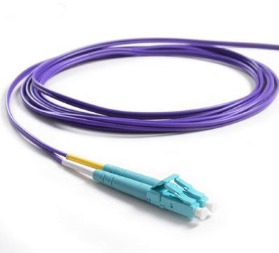 China Purple Fiber Optic Jumper , LC/UPC To LC/UPC OM4 Purple Duplex 3.0mm 8Mtrs LSZH for sale