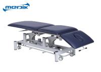 China 3 Sections Electric Medical Physician Exam Tables With Foot Switch For Clinic for sale