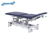China 3 Sections Electric Medical Physician Exam Tables With Foot Switch For Clinic for sale