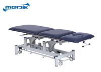 China 3 Sections Electric Medical Physician Exam Tables With Foot Switch For Clinic for sale