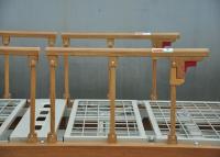 China Two Manual Crank Nursing Home Beds Solid Wood Structure Aluminum Alloy Side Rail for sale