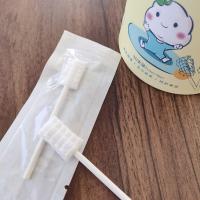China Disposable Baby Oral Skimmed Gauze Cleaning Brush Cotton Swab Mouth Tongue Cleaner for sale