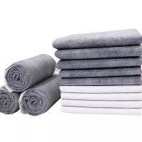 China Disposable Pet Training Pads with Super Absorbent Bamboo Charcoal and Adhesive Sticker for sale